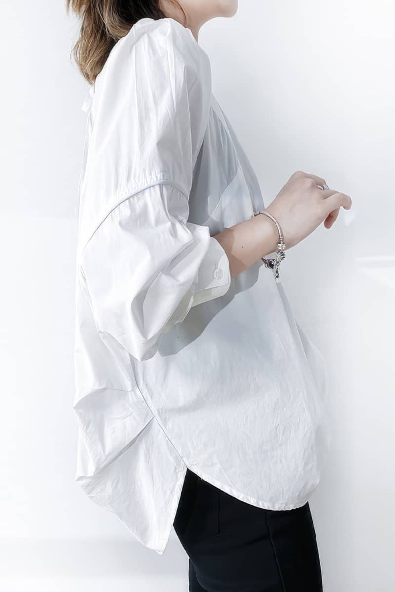 Irregular long-sleeved pullover top